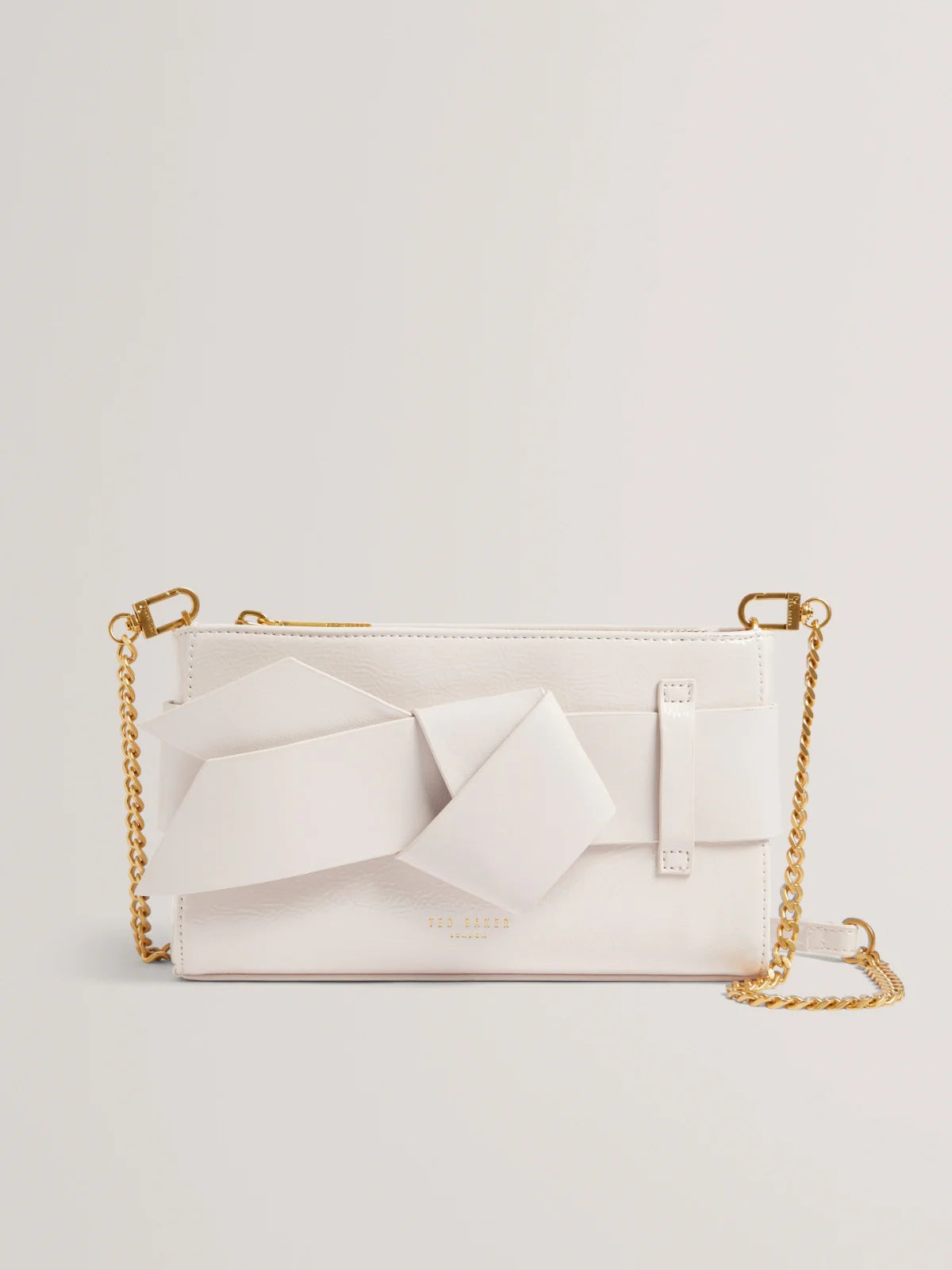 Ted Baker | Jimmah bow clutch in ivory | EQVVS Womens